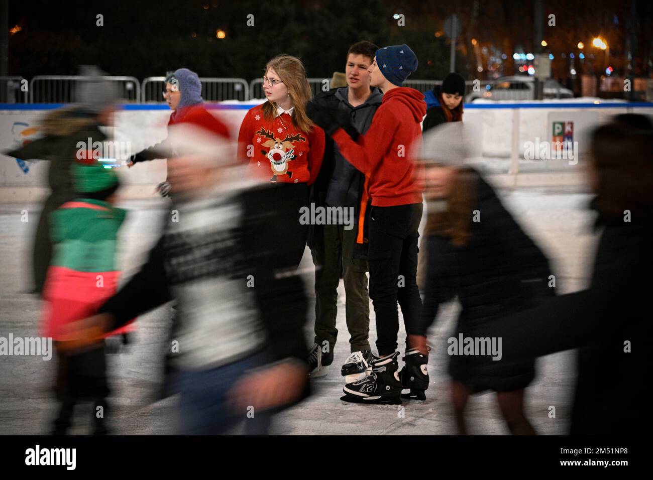 Young people are seen on an ice skating rink in Warsaw, Poland on 22 ...