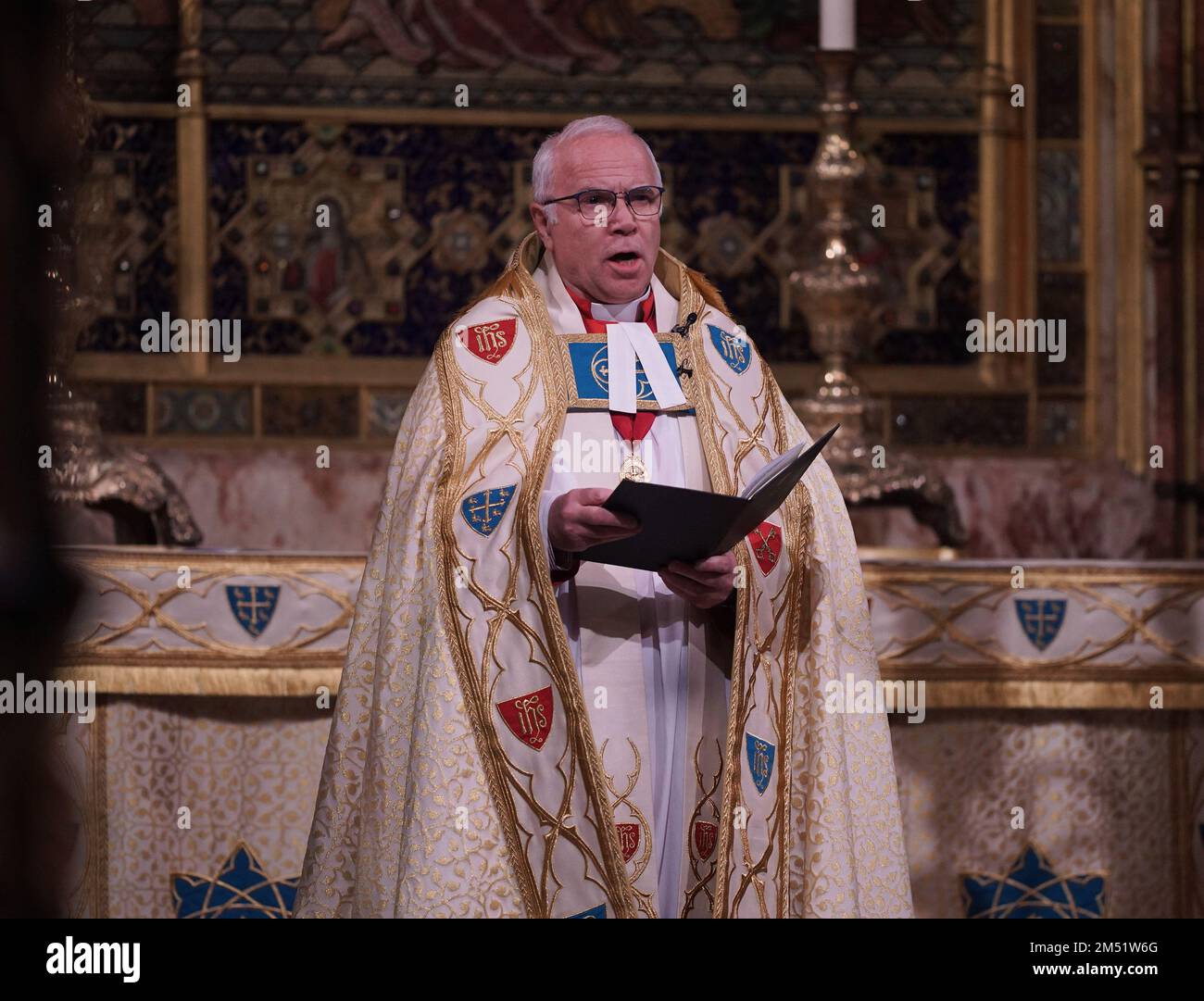 Dean of Westminster David Hoyle reading John 1: 1-5, 14, during the ...