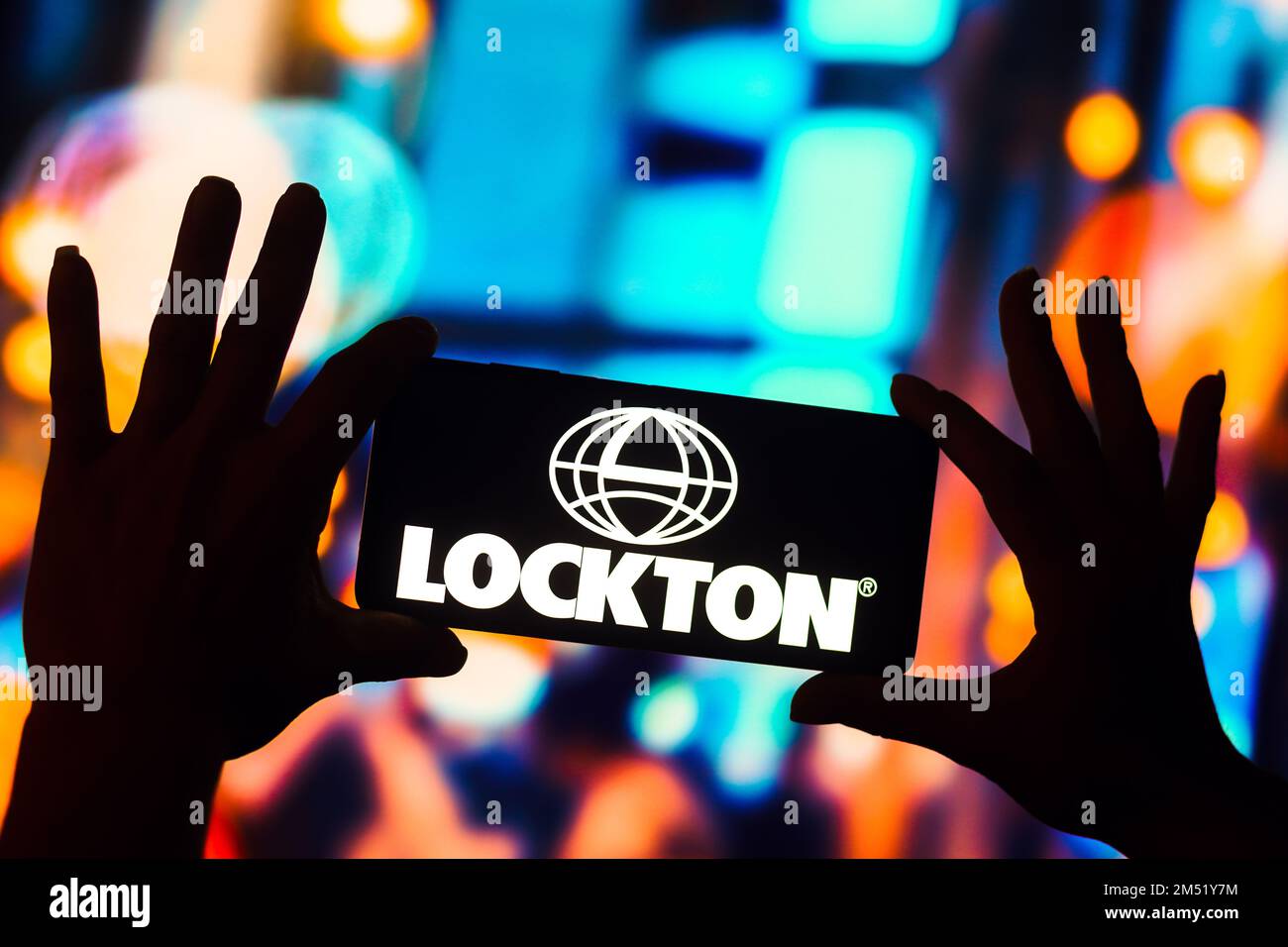 In this photo illustration, the Lockton Companies Inc. logo is ...