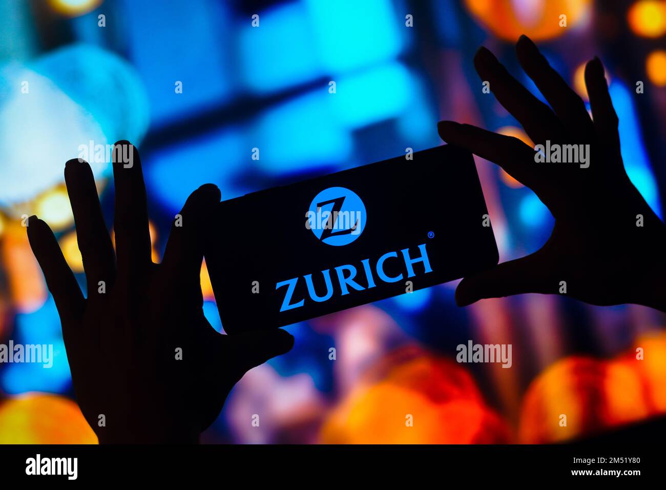 In this photo illustration, the Zurich Insurance Group logo is ...
