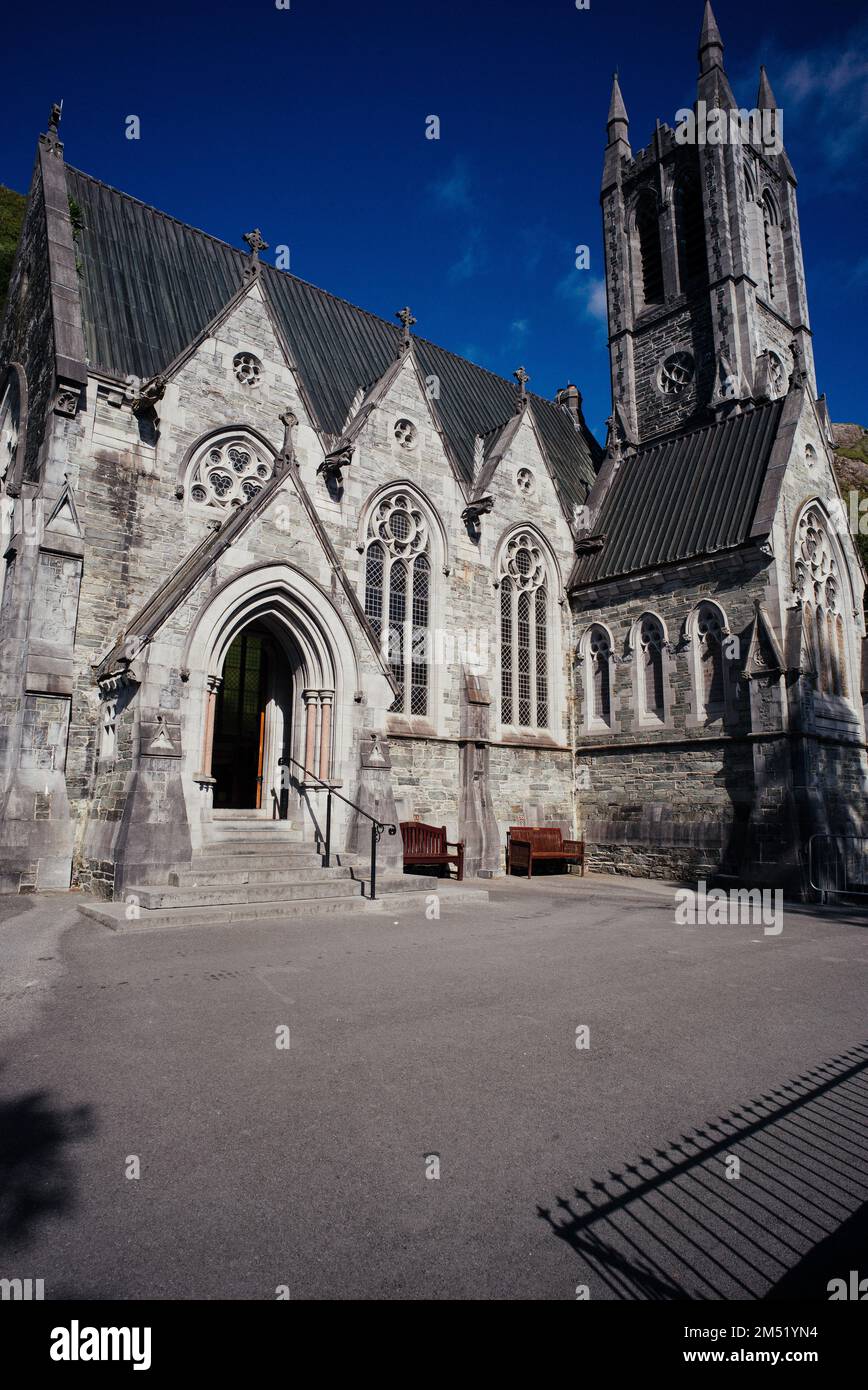 The facade of Kylemores Neo Gothic Church against a blue sky Stock ...