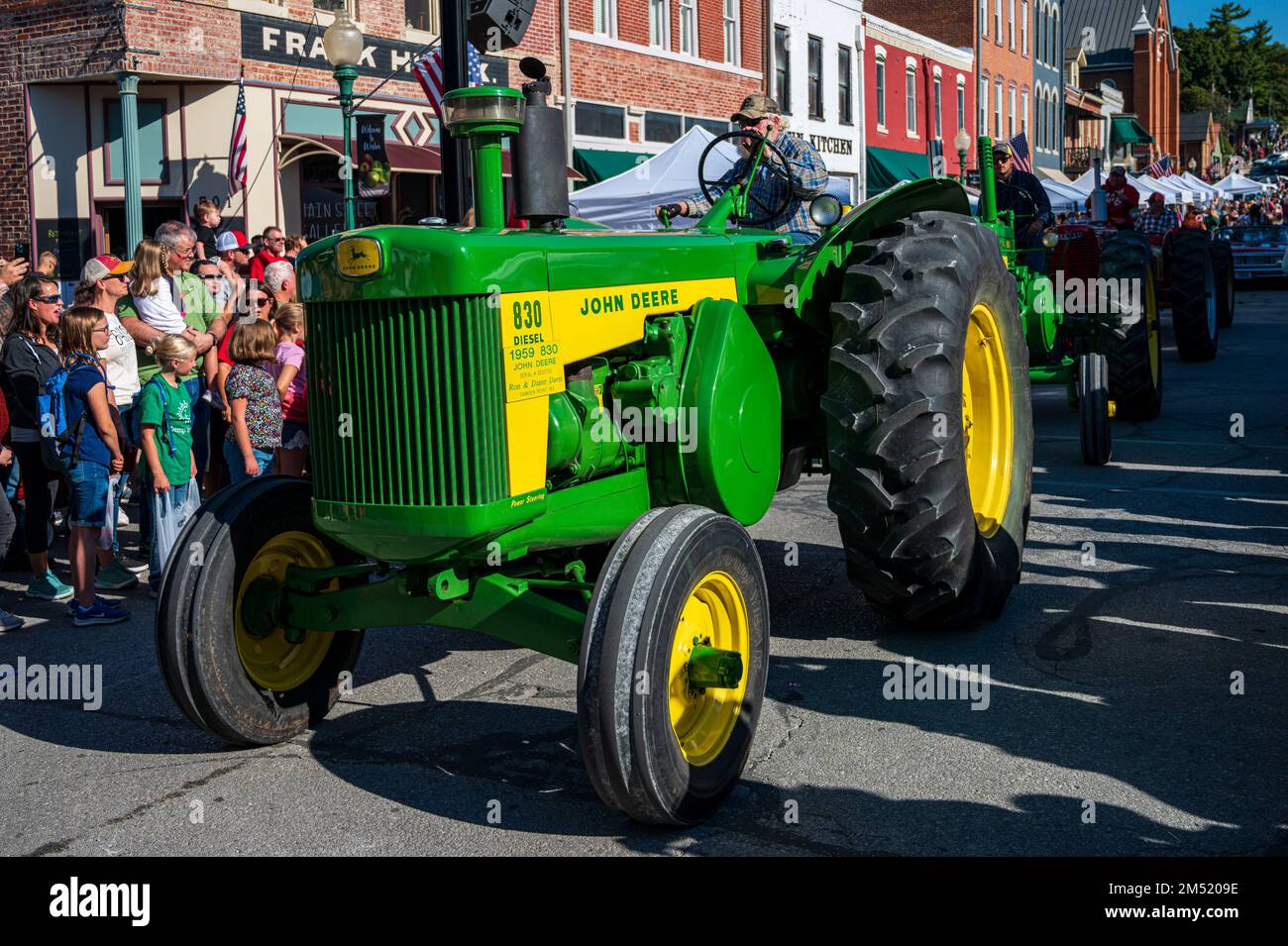 A Vintage tractor in small town Applefest parade Stock Photo - Alamy