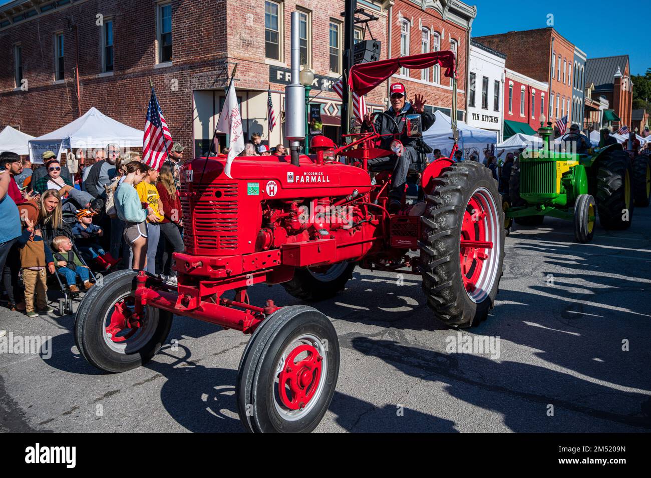 A Vintage tractor in small town Applefest parade Stock Photo - Alamy