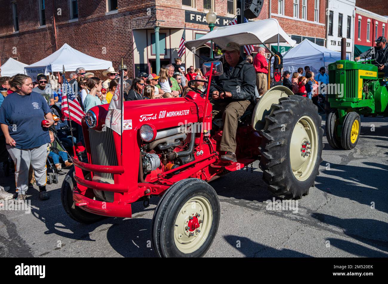 A Vintage tractor in small town Applefest parade Stock Photo - Alamy