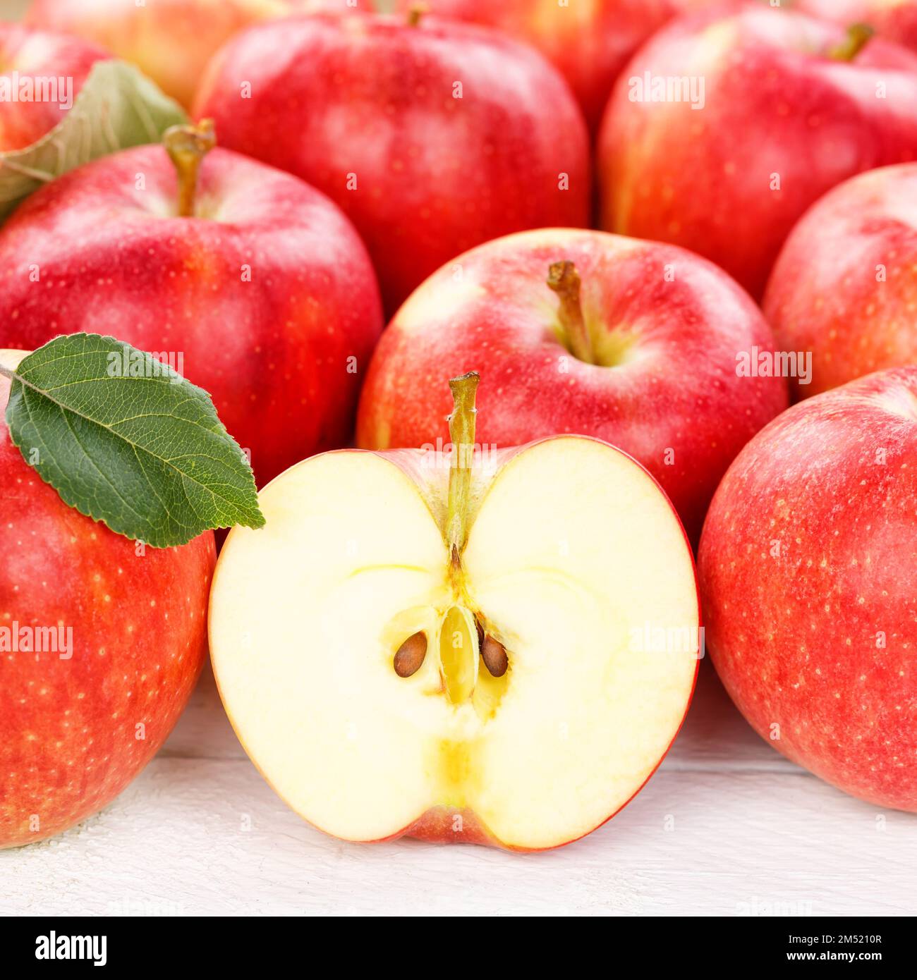 Apples sliced apple fruits fruit with leaves square background leaf ...