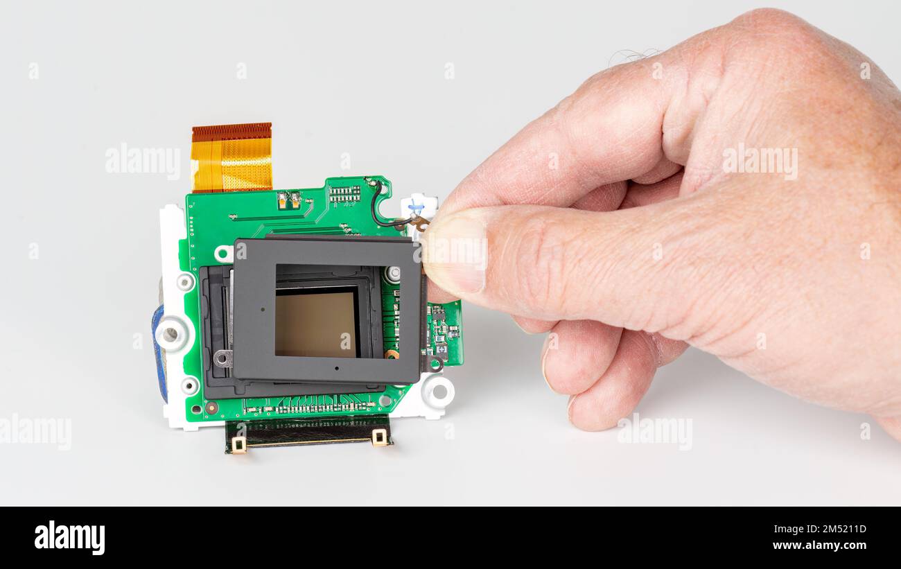Camera pair replaces the cover over the sensor Stock Photo - Alamy