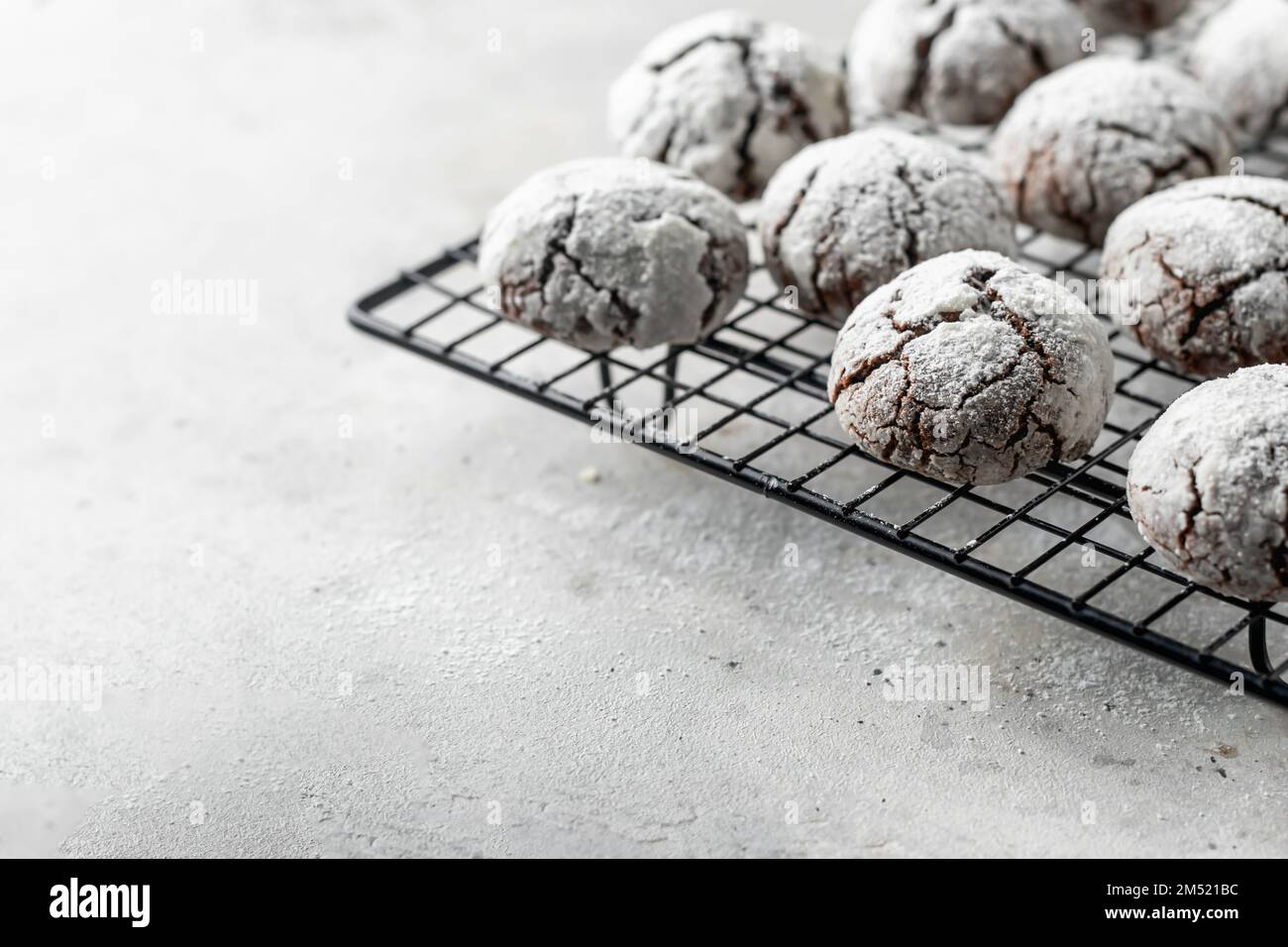 Chocolate chip cracked cookies. Metallic rack with fresh baked ...