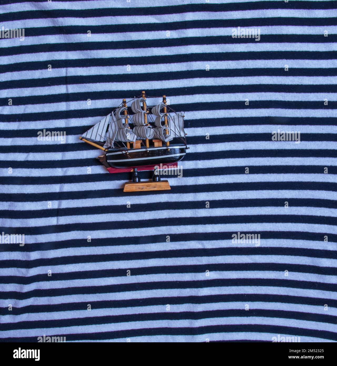 Ship on the background marine textile texture for the background. Close ...