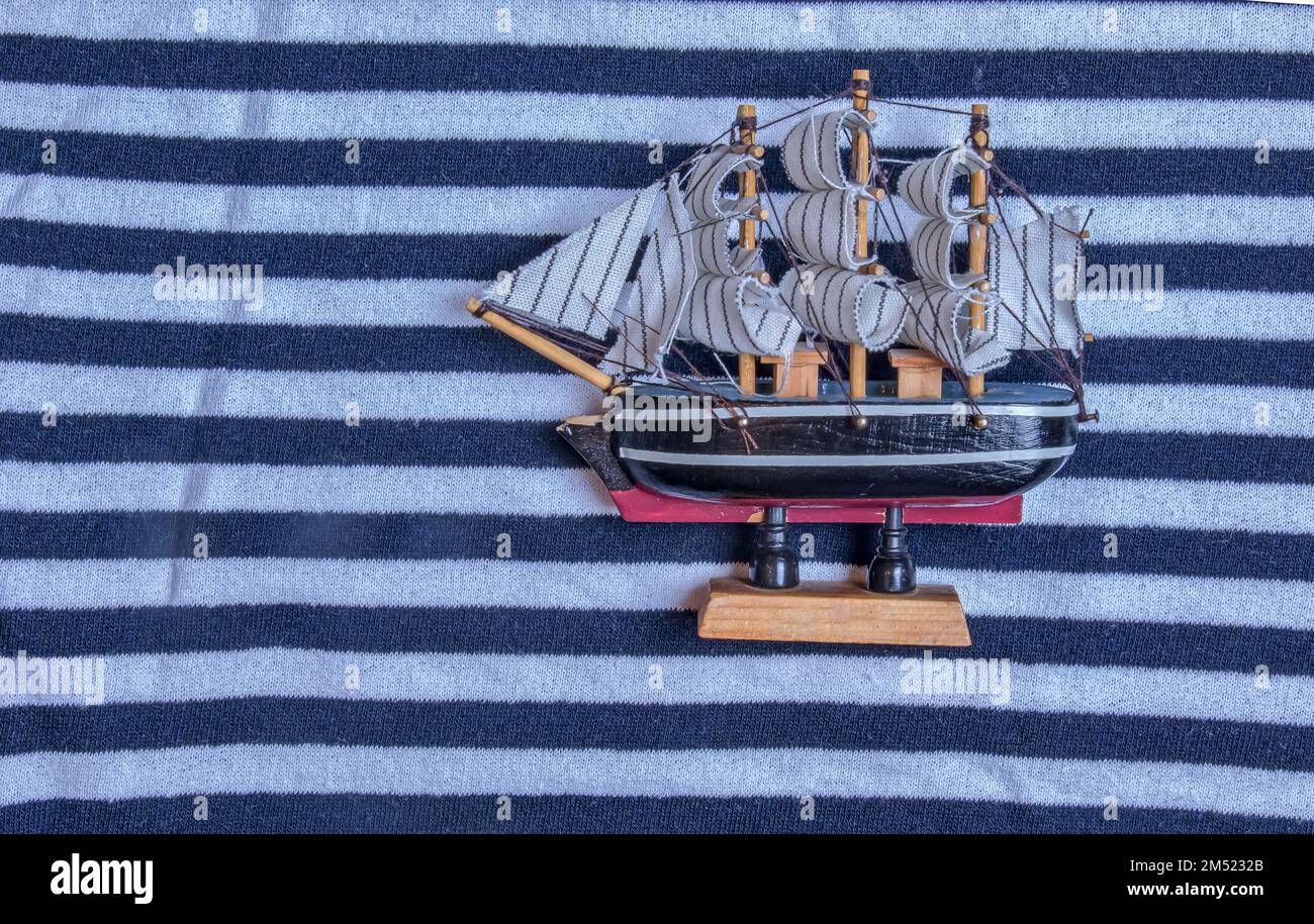 Ship on the background marine textile texture for the background. Close ...