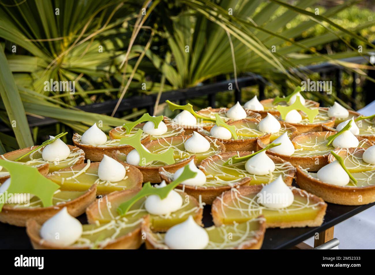 Stock Image of A large tray of fancy sweet desserts served in an ...