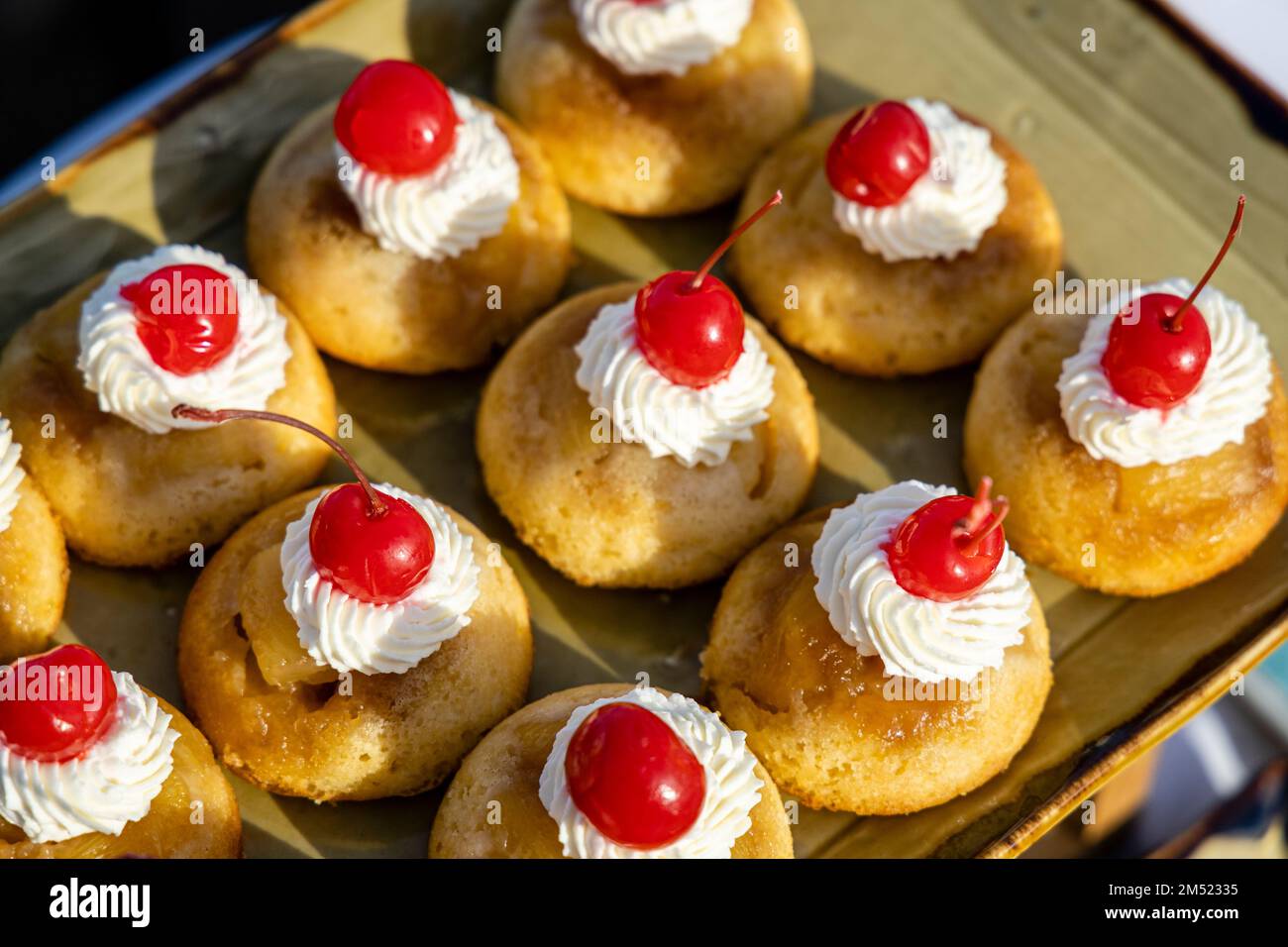 Stock Image of A large tray of fancy sweet desserts served in an ...