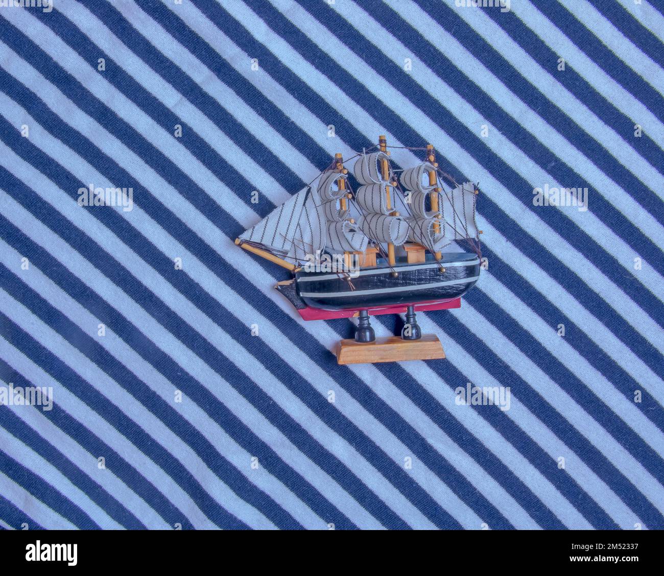 Ship on the background marine textile texture for the background. Close ...