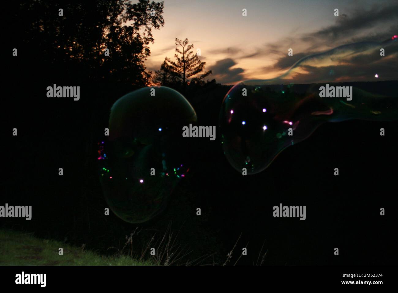 Glistening giant bubbles hi-res stock photography and images - Alamy