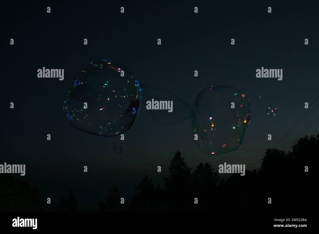 Glistening giant bubbles hi-res stock photography and images - Alamy