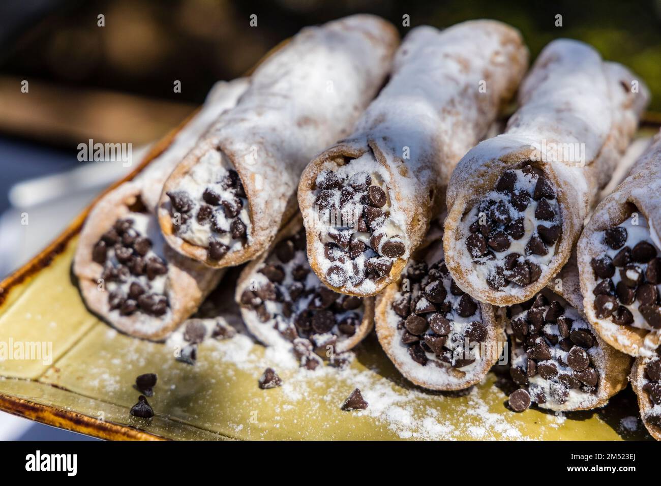 A large tray of fancy sweet desserts served in an outdoor buffet Stock ...