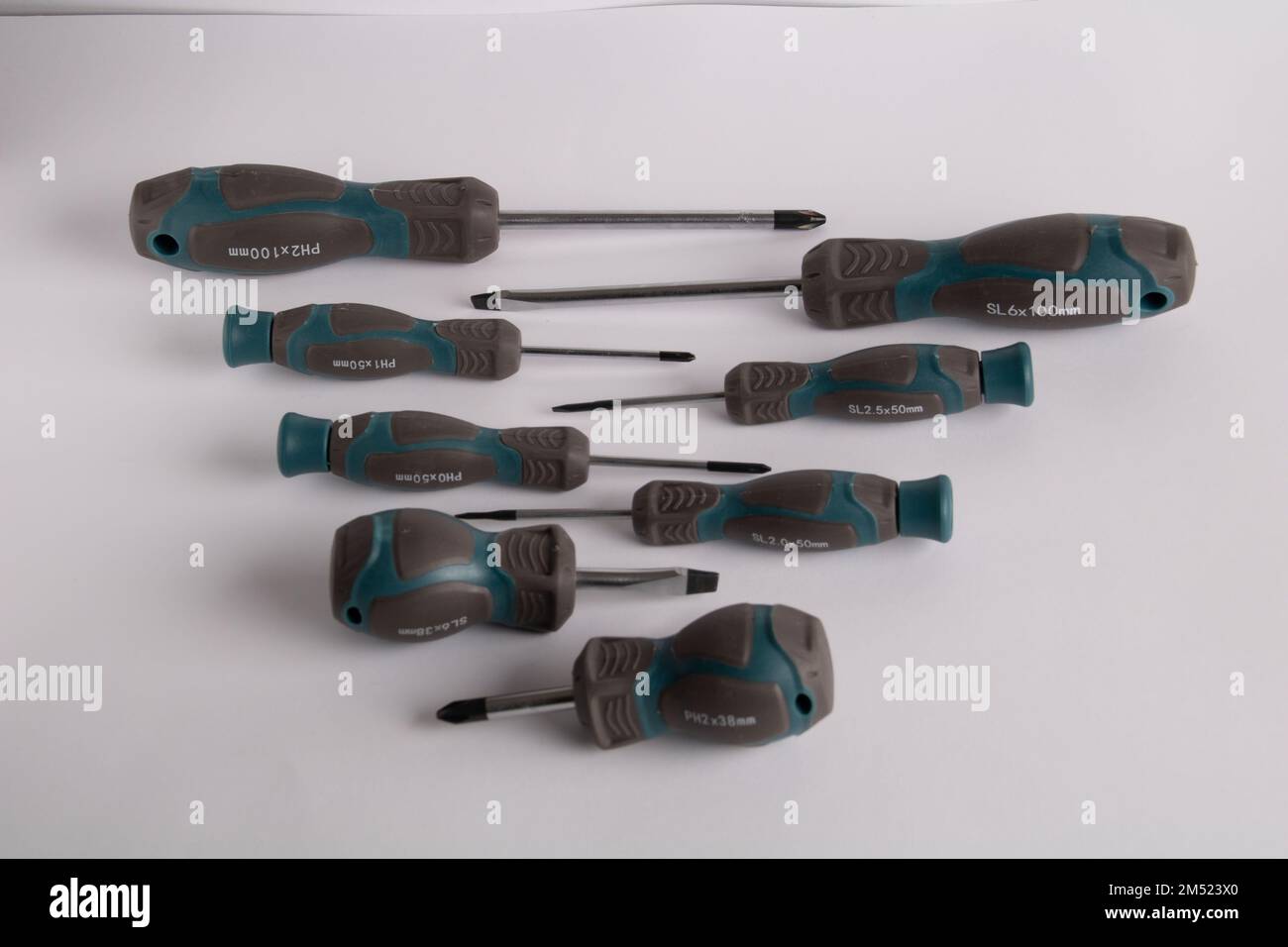photo of a lot of different screwdrivers side by side on a white ...