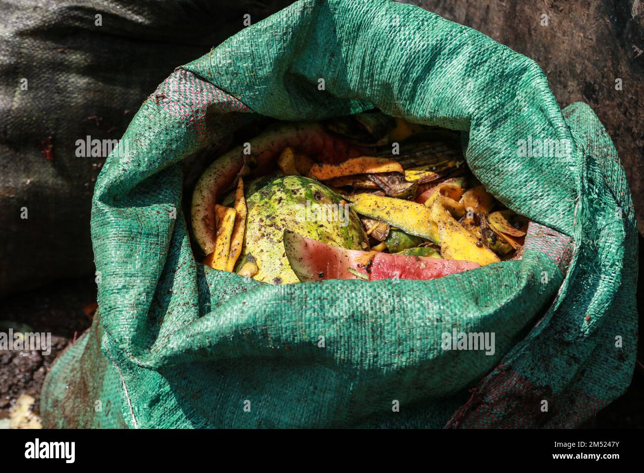 A view of spoilt fruits and vegetables in a sack at a Market in Nakuru ...