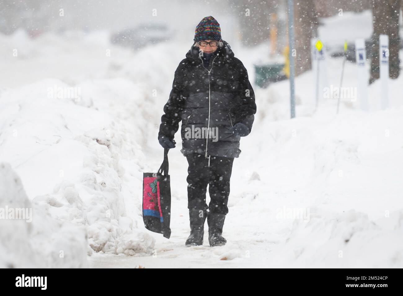 December 24, 2022, Ottawa, ON, Canada: A person makes their way through ...
