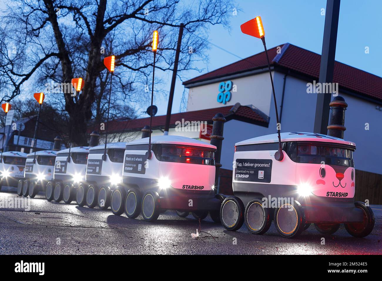 A group of Starship robots prepare to carry out grocery deliveries for ...