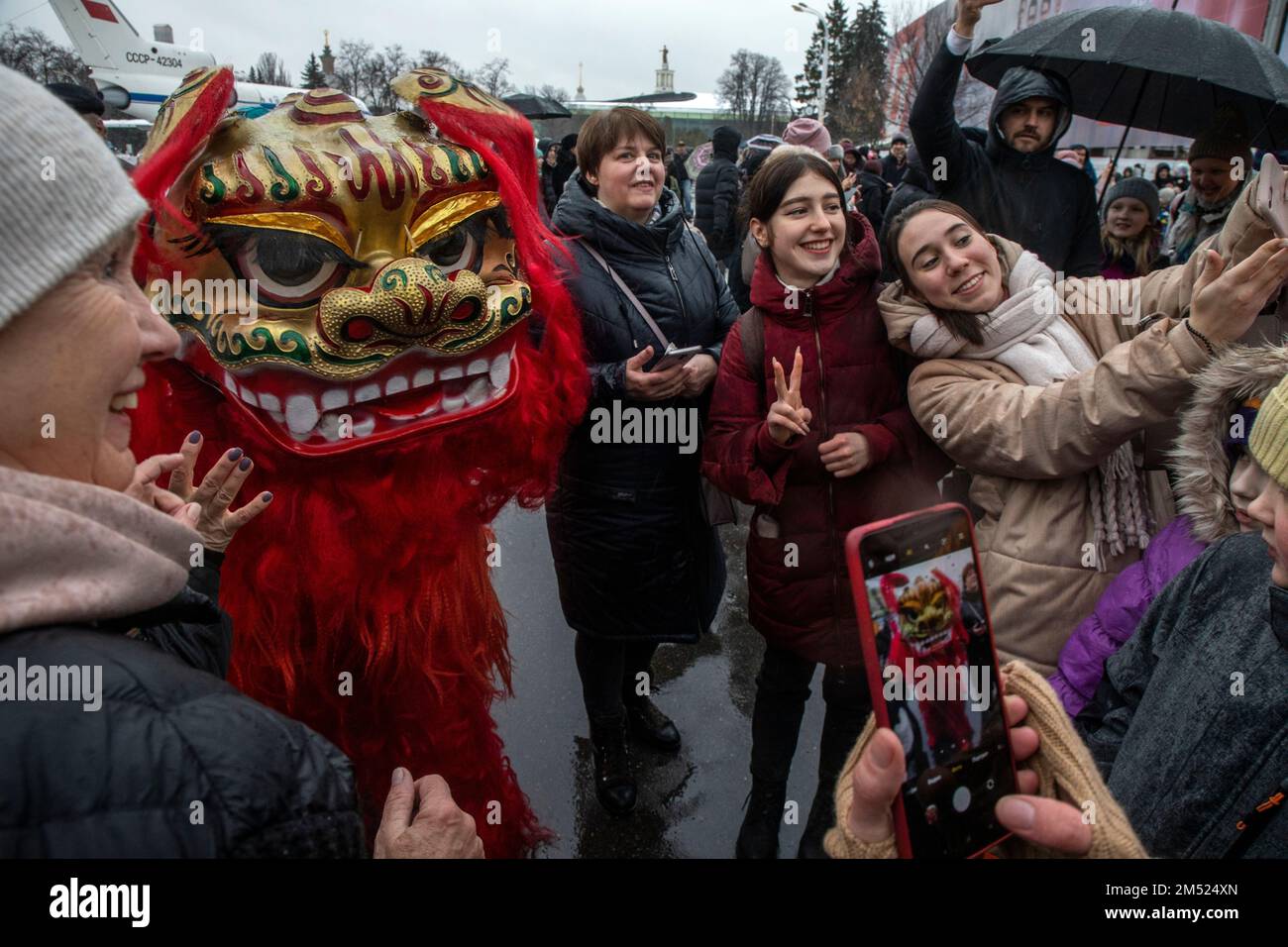 Moscow, Russia. 24th of December, 2022. Russian people react to a ...