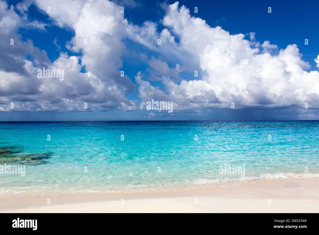 The scenic view of turquoise color waters on Half Moon Cay beach and ...