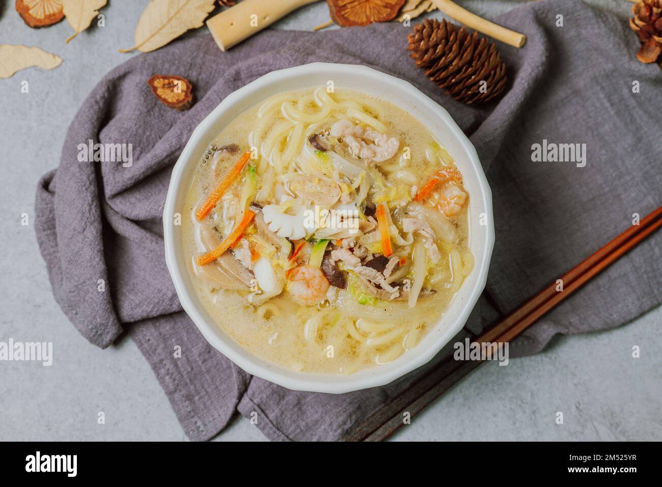 Korean style spicy white noodle soup with seafood 'hayan jjamppong ...