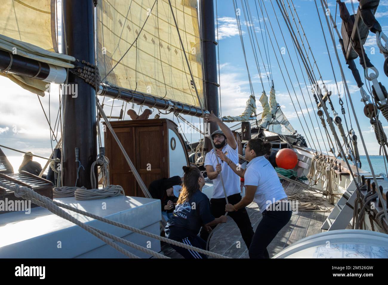 A closeup view of people sailing at a Spanish tall ship of Pascual ...