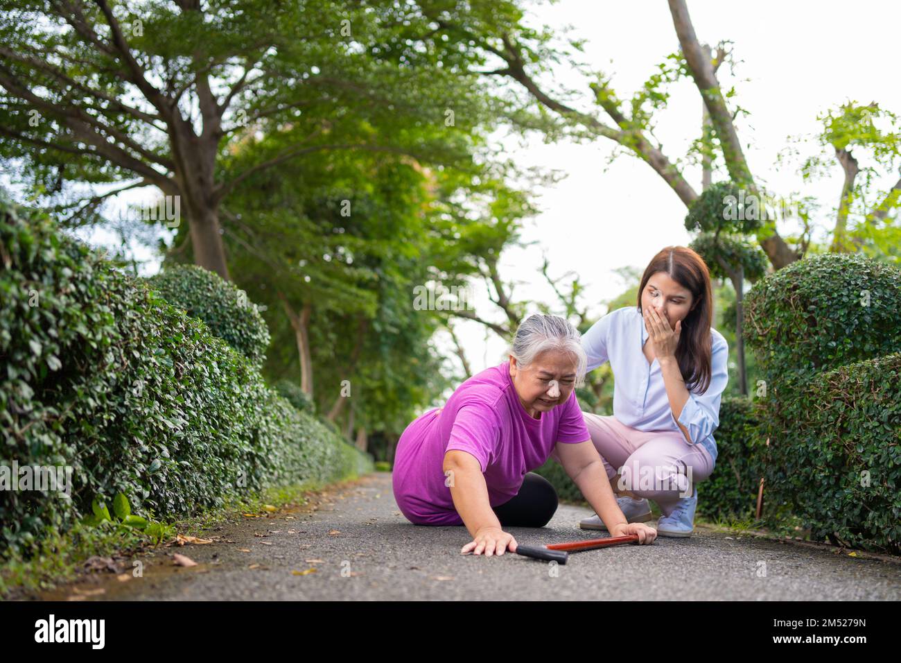 Asian senior woman fell down on lying floor because faint and limb ...