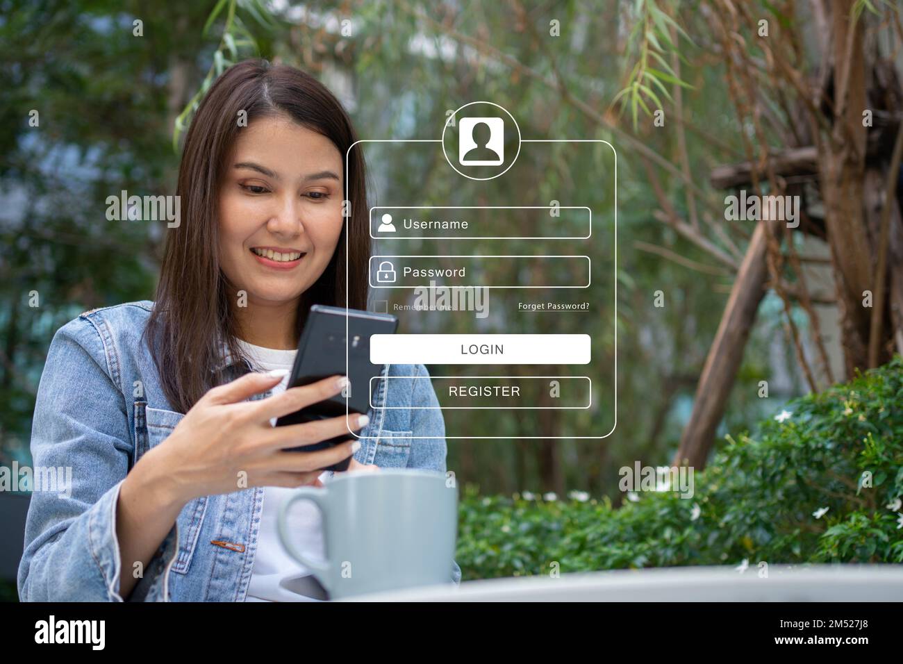 Woman using smartphones to type user and passwords for login financial ...