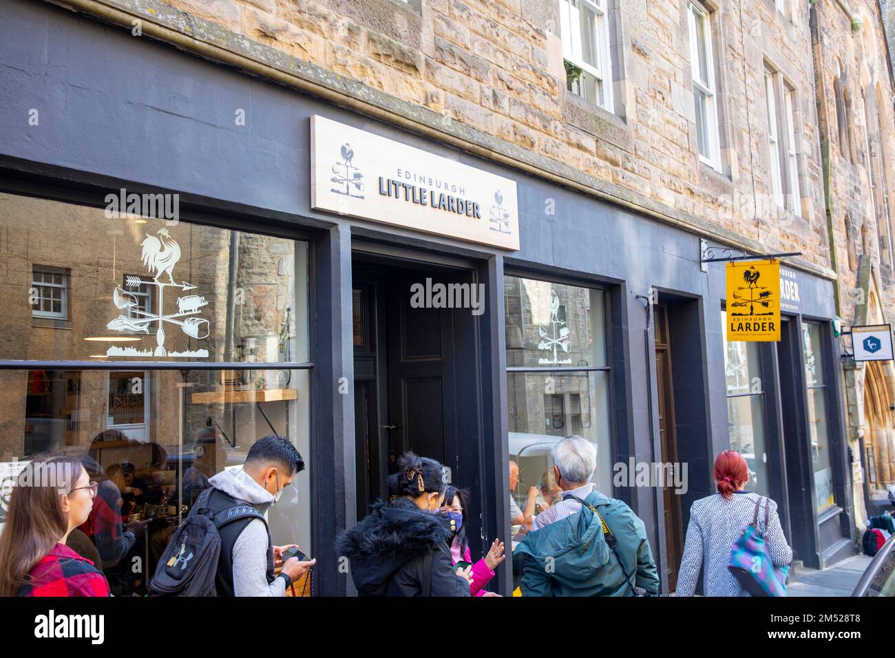 Edinburgh city centre, people queue for breakfast outside Larder and ...