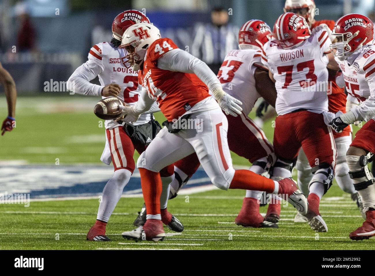 Houston Cougars defensive lineman D'Anthony Jones (44) knocks the ball ...