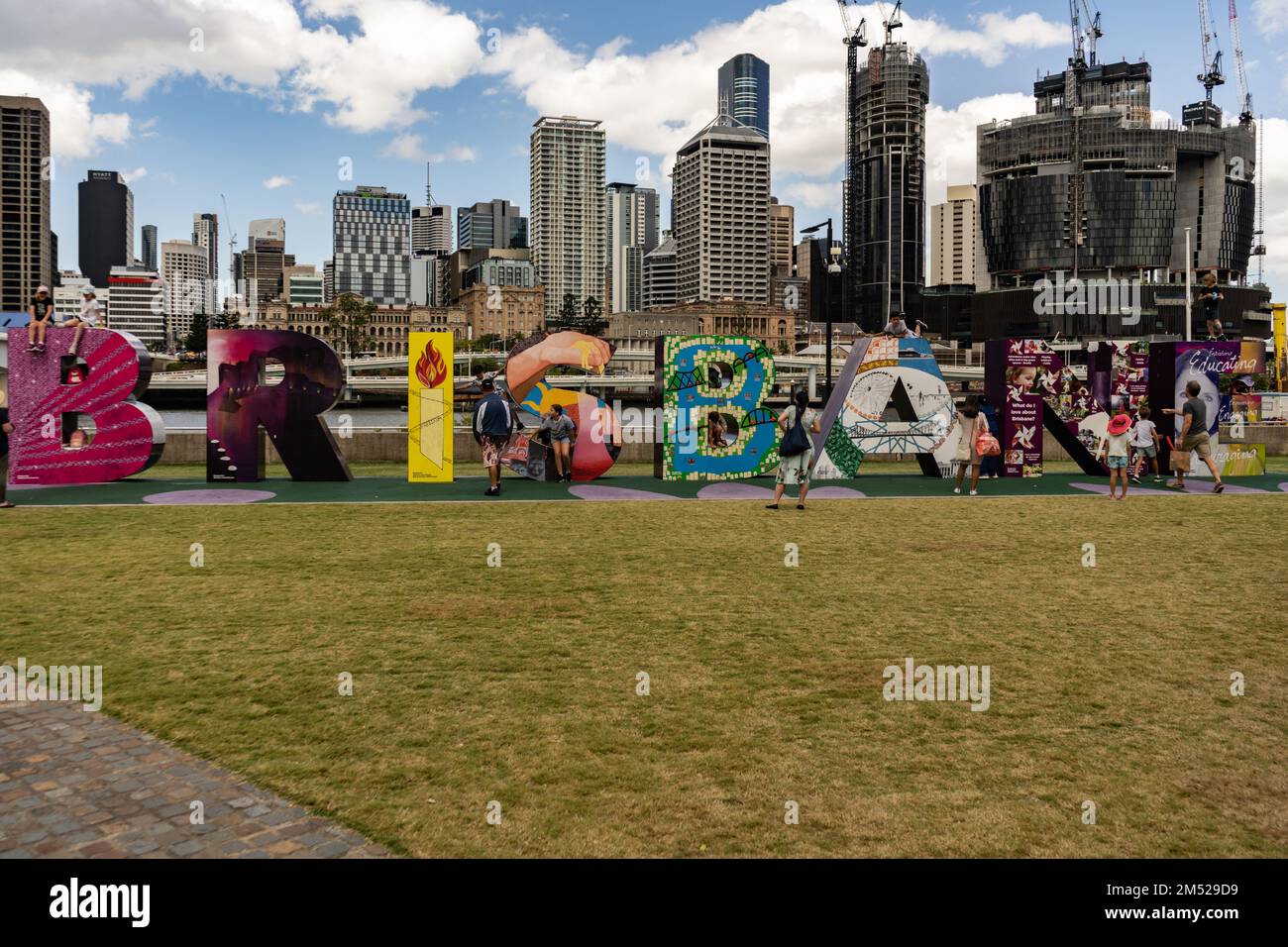 Brisbane sign on Southbank with kids playing on it with Brisbane City ...