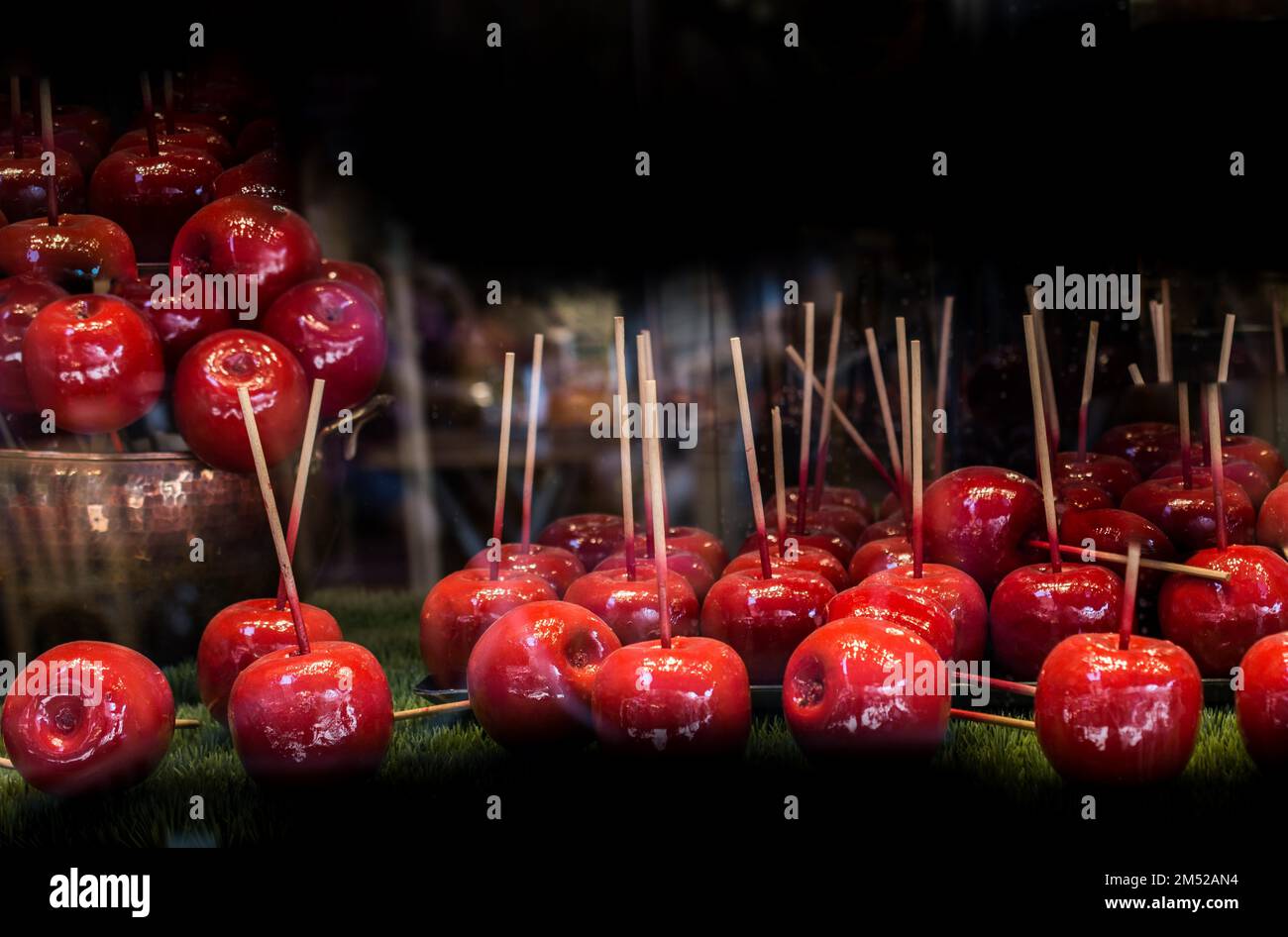 Candy apples are whole apples covered in a hard toffee or sugar candy ...
