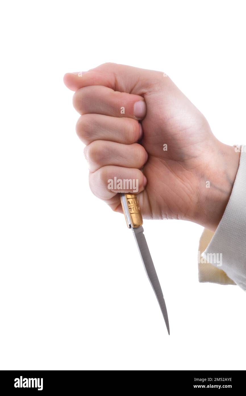 Hand holding a knife in hand on a white background Stock Photo - Alamy