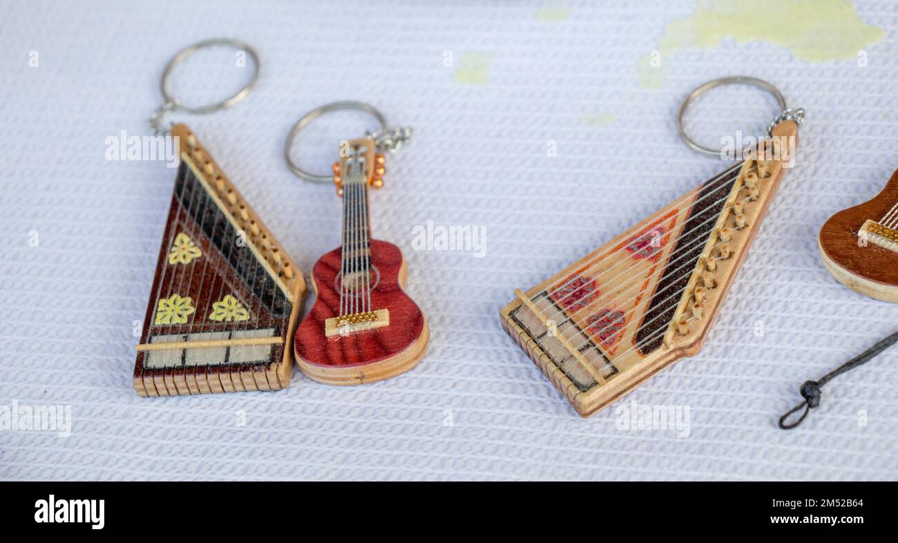Set of models of musical instruments made of wood Stock Photo - Alamy