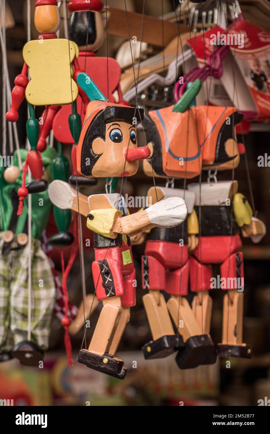 Set of wodden puppet Pinocchio in outdoor bazaar Stock Photo - Alamy