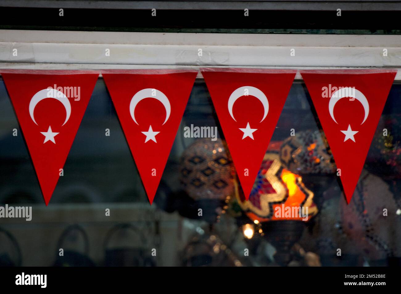 Triangle shaped Turkish national flags are attached to a rope Stock ...