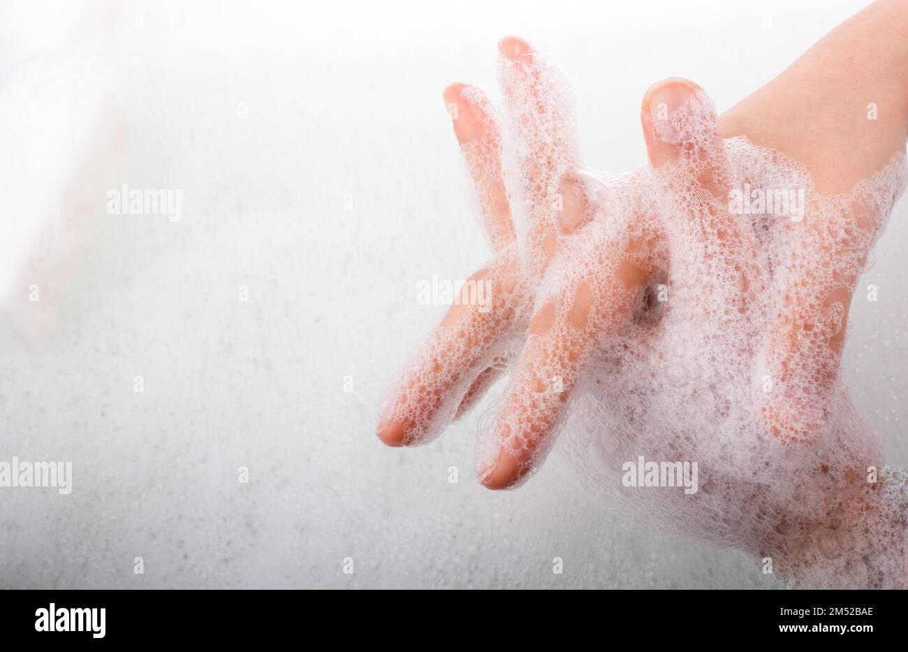 Hand washing and soap foam on a foamy background Stock Photo - Alamy