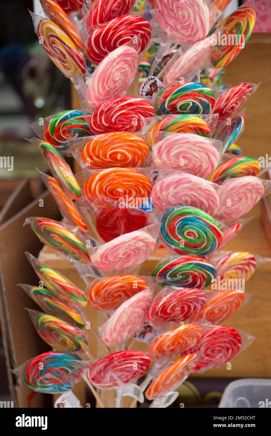 Delicious colorful swirl candy and sweets for kids Stock Photo - Alamy