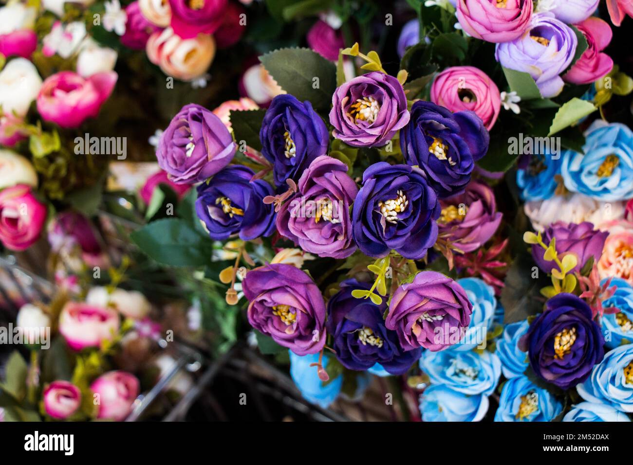 Fake colorful flowers for decorative purposes Stock Photo - Alamy
