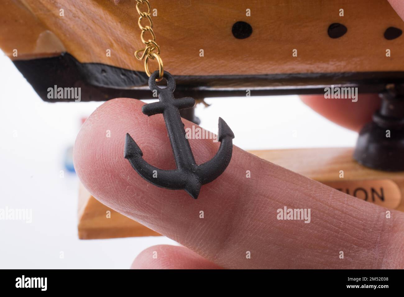 Hand holding Ship model on a white background Stock Photo - Alamy