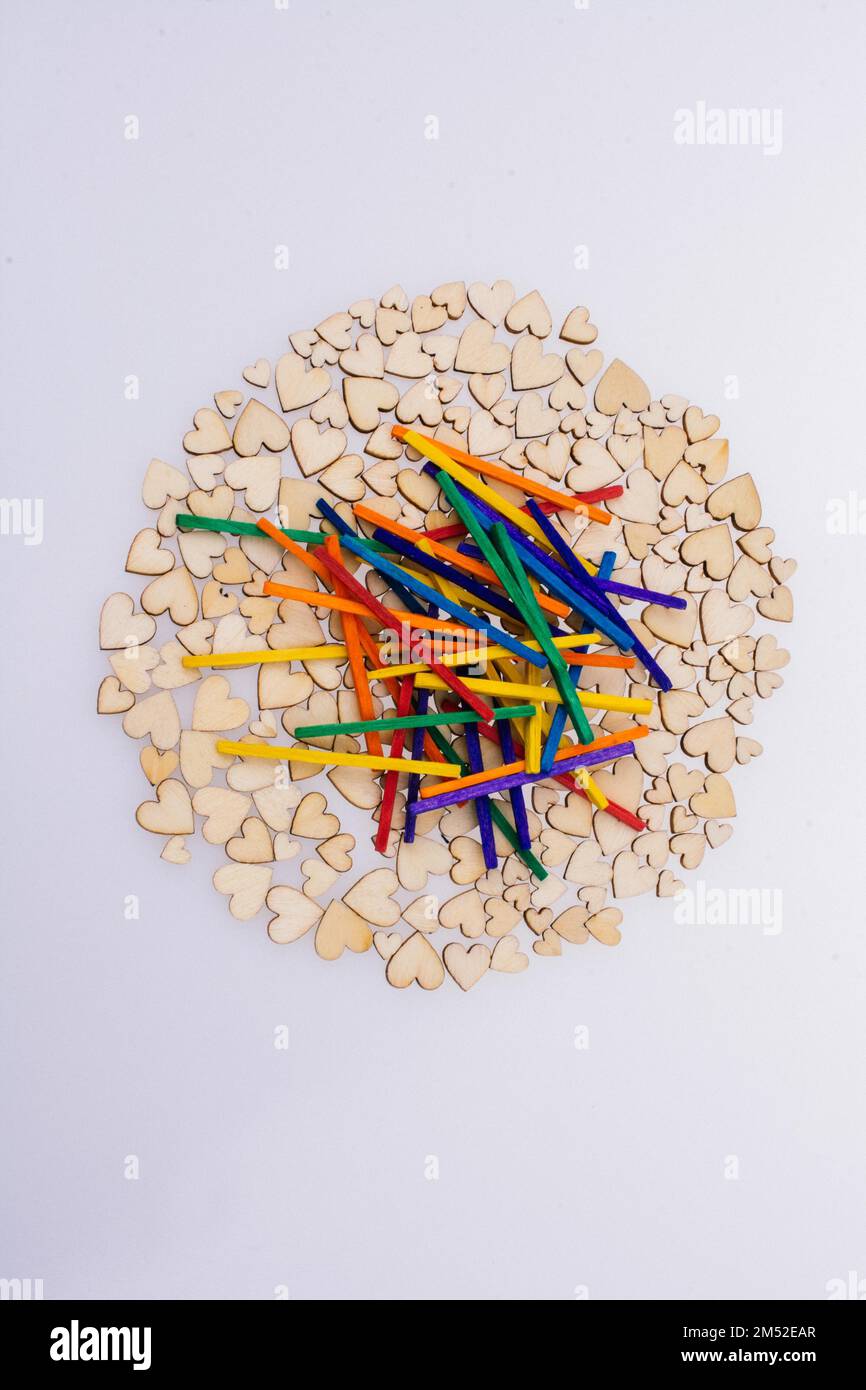 Beautiful coloured wooden sticks for creativity on black background ...