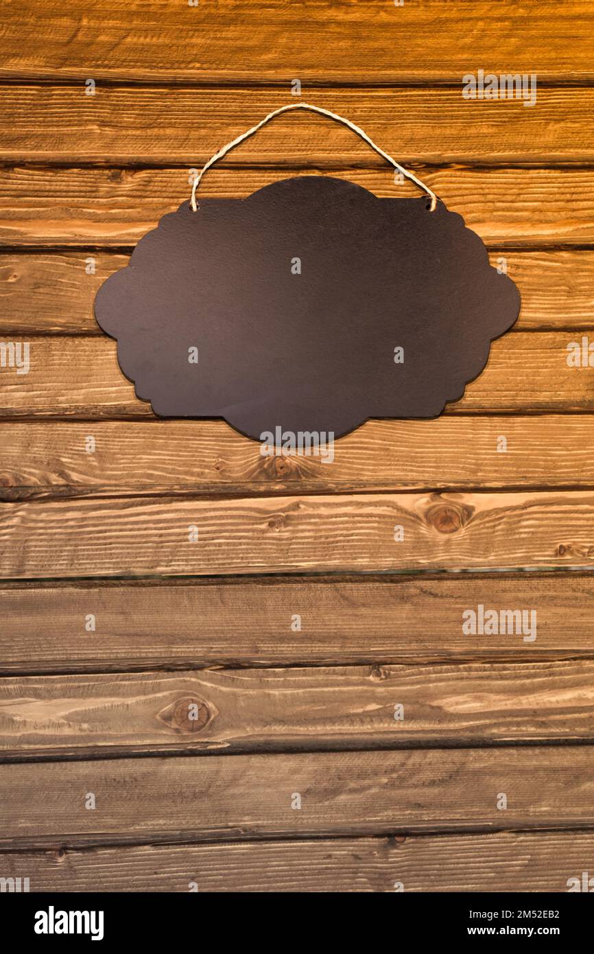 Black Empty Sign Board with string for hanging on wall Stock Photo - Alamy