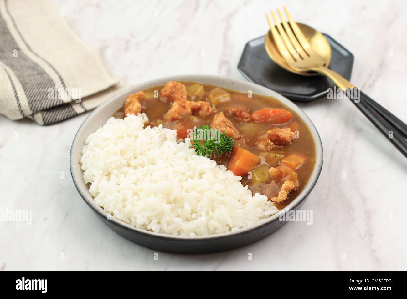 Rice Japanese Curry with Crispy Chicken Popcorn, Potato, and Carrot. On ...