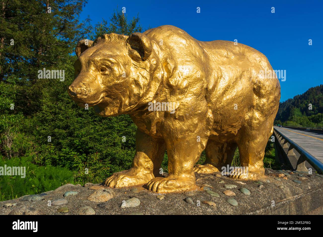 Golden bear statue on the Klamath River bridge, Klamath, California USA ...