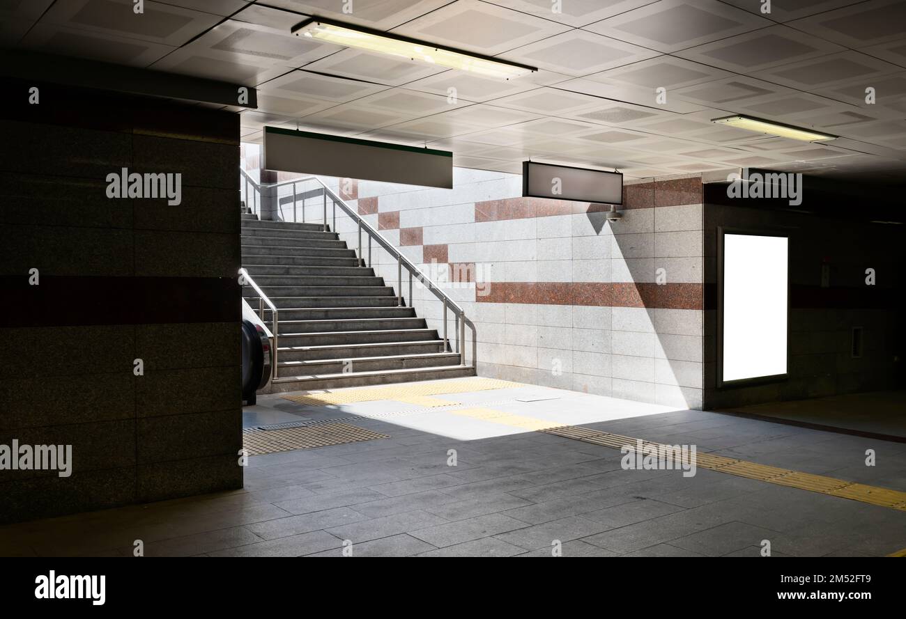 The interior of modern subway station with light coming from the ...