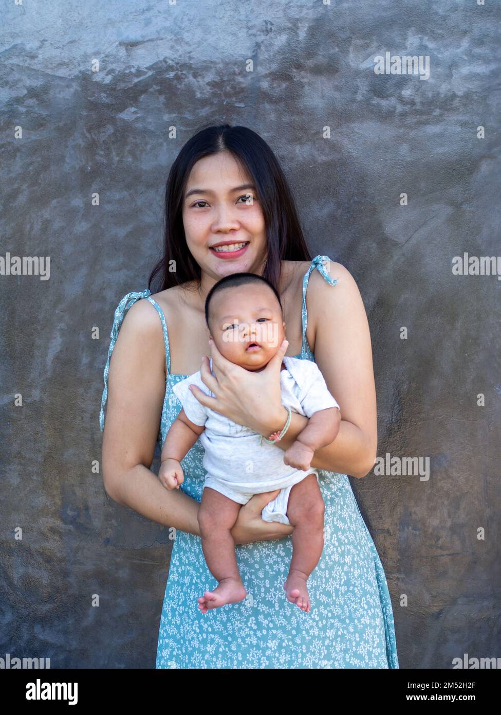 Woman and baby Asian and nationality Thai is happy feel Stock Photo - Alamy