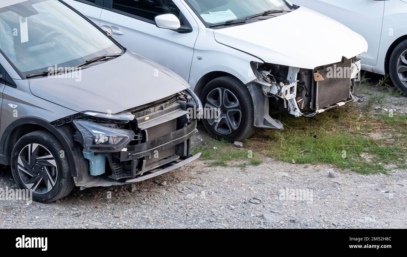 The damaged cars after accident, front view Stock Photo - Alamy