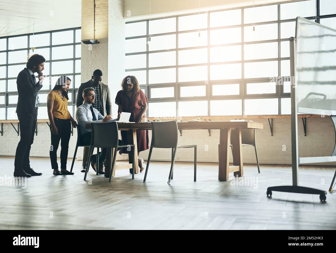 Tough teams outlast tough times. a diverse team of businesspeople ...