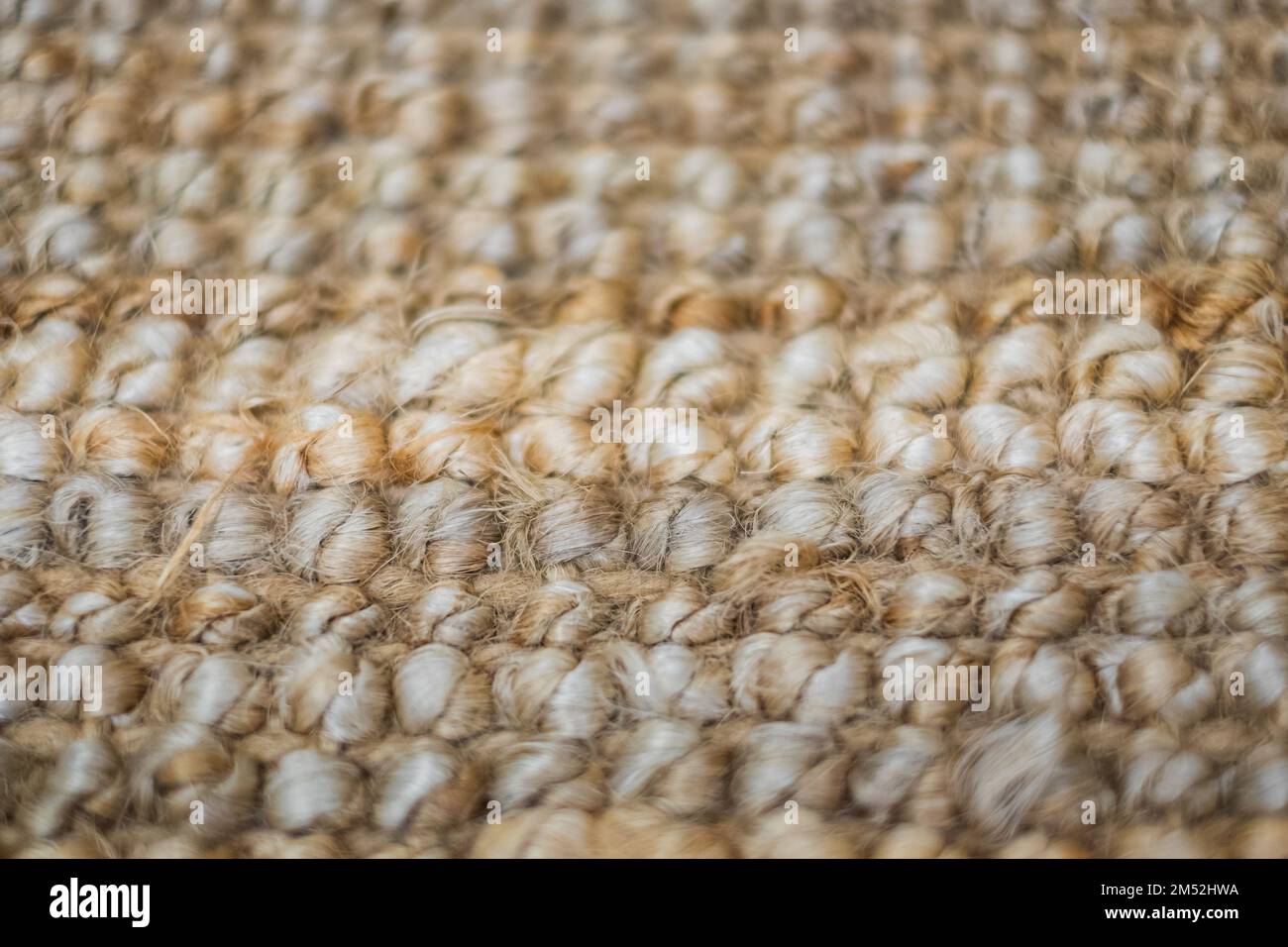 Natural linen texture for the background. Handmade rug made of jute. Jute knitted fabric. Nobody ...